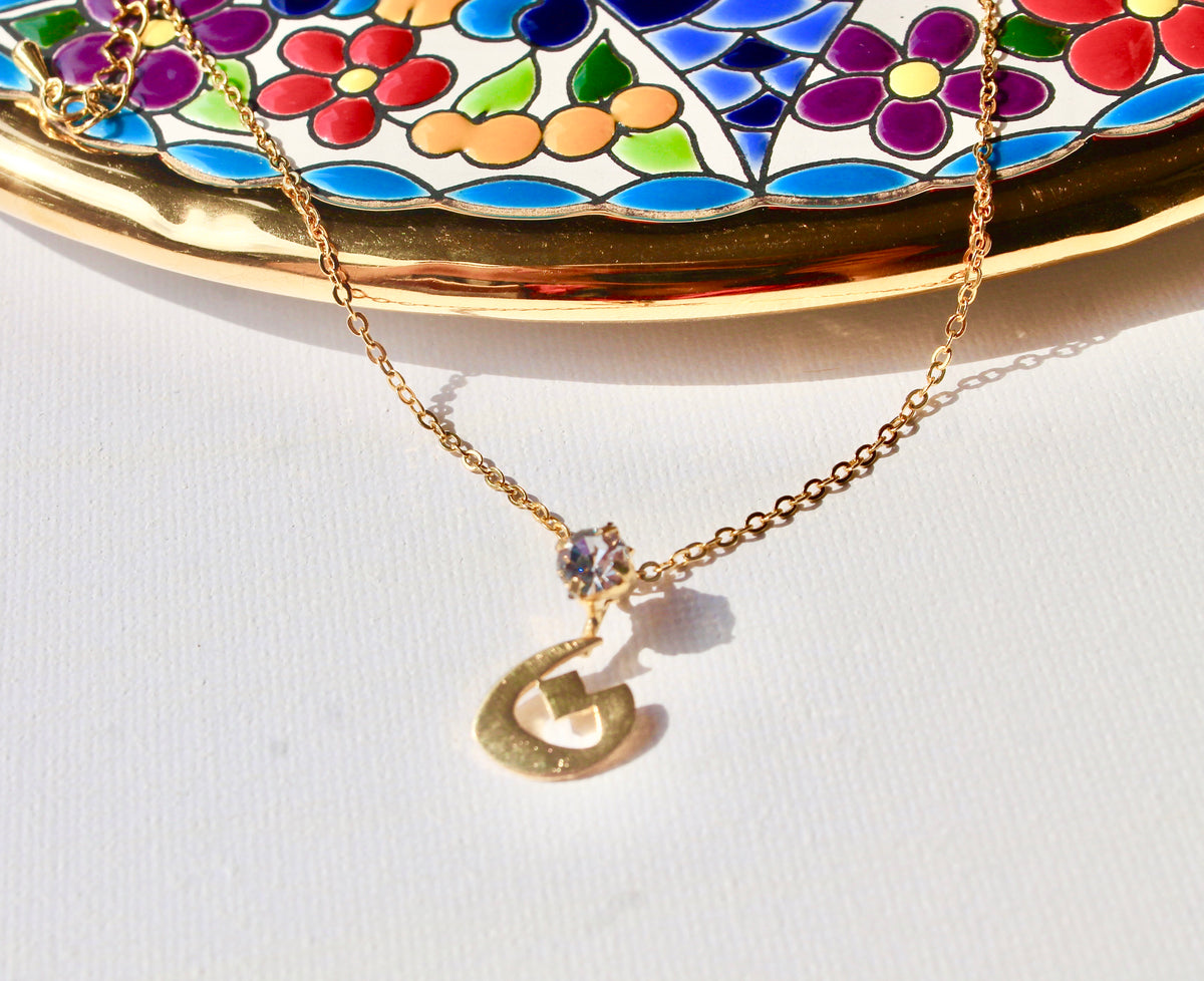 Number 5010: Calligraphy pendant – SCHANTAA